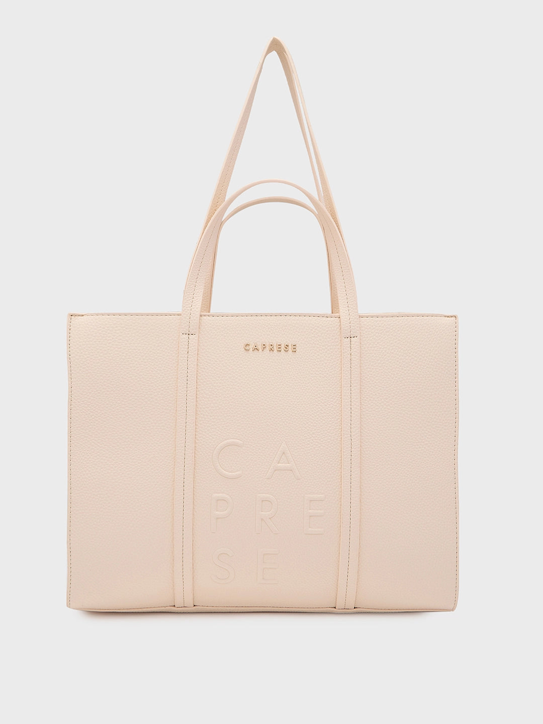 Buy Caprese Roni Medium Beige Tote Bag @ Rs.3799 | Caprese Bags